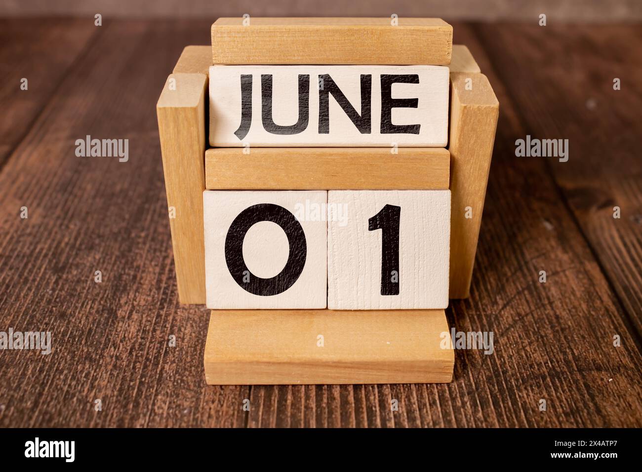 June 1st. Day 1 of month, calendar on yellow background. First summer ...