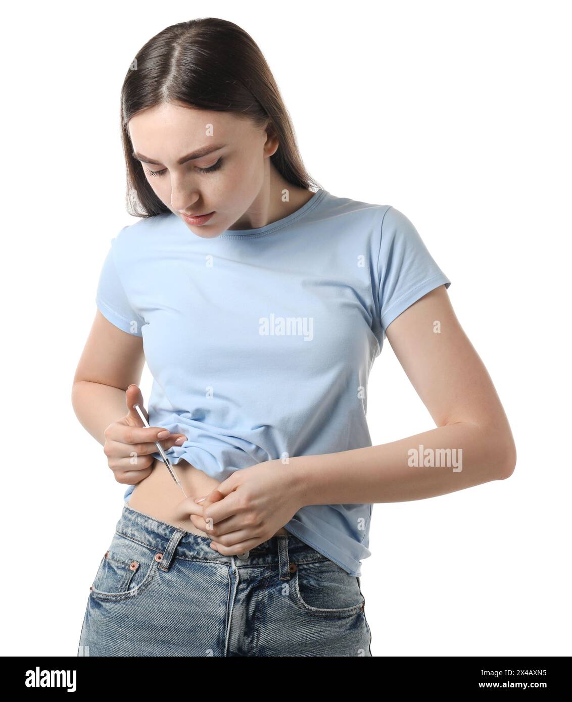Diabetes. Woman making insulin injection into her belly on white ...