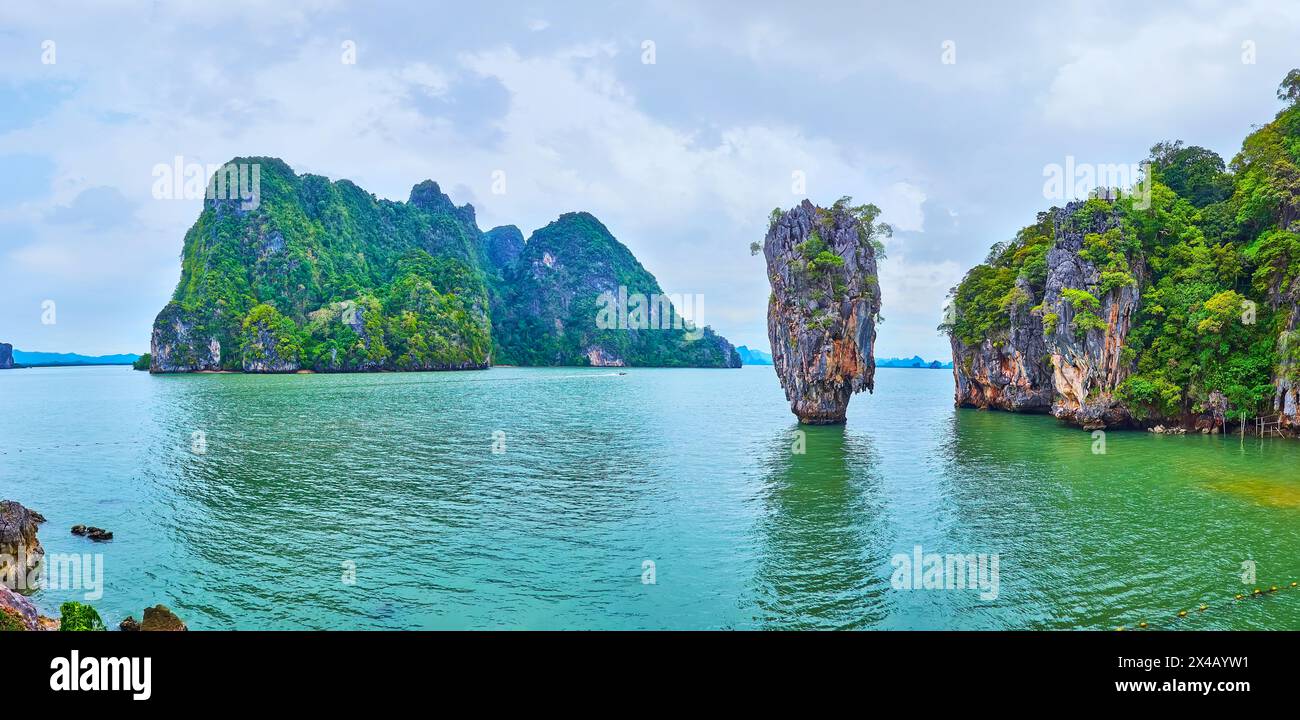 Panorama with Ko Ta Pu karst tower, covered with greenery and ...