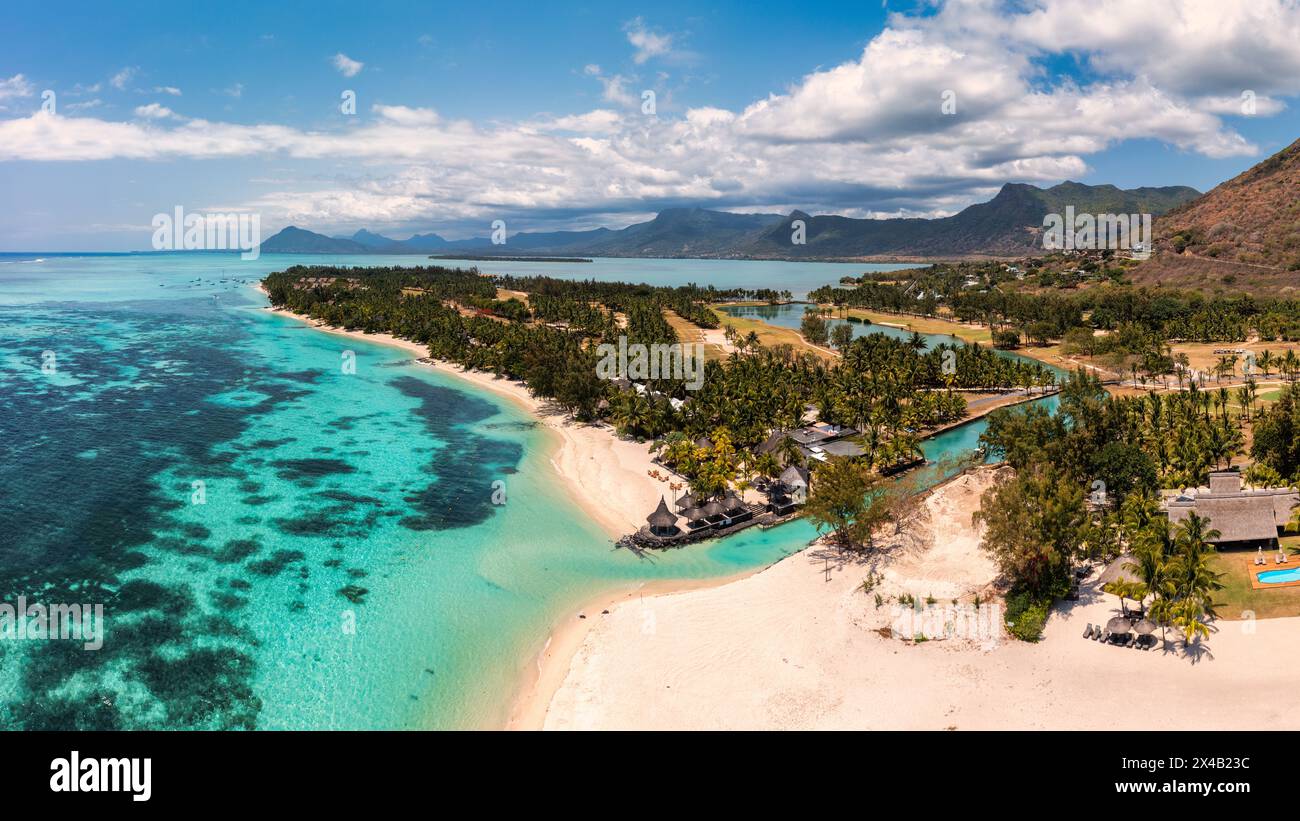 Beach with palm trees and umbrellas on Le morne beach in Mauriutius ...