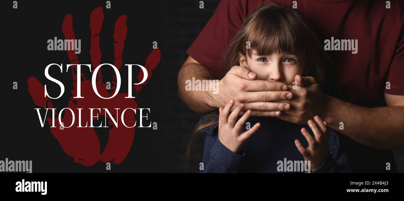 Father covering mouth of his scared little daughter on dark background ...