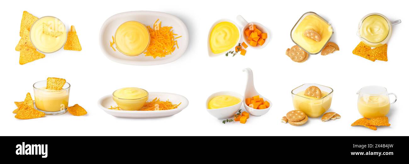 Set of bowls with tasty cheddar cheese sauce and snacks on white ...