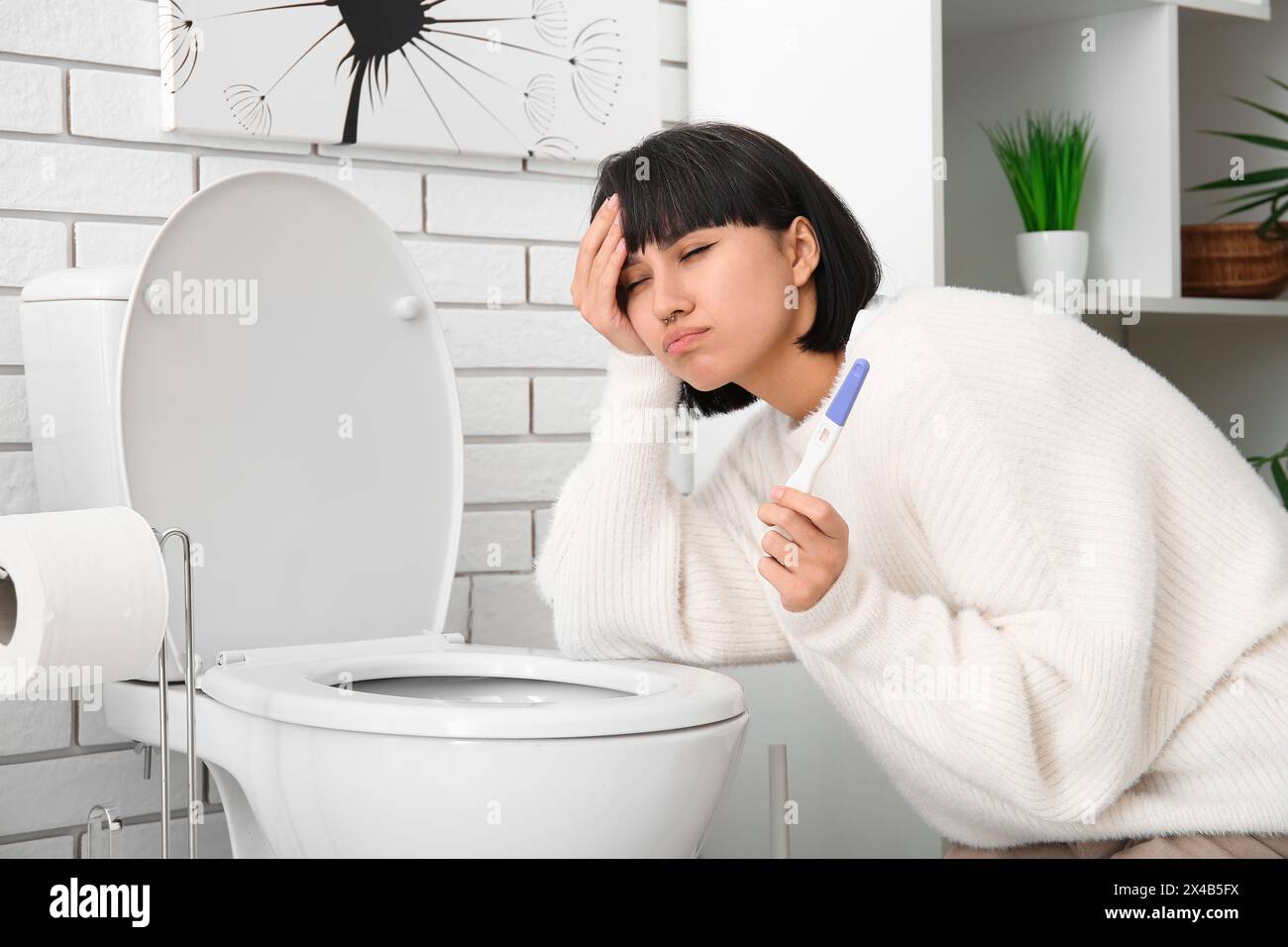 Girl toilet sick hi-res stock photography and images - Alamy