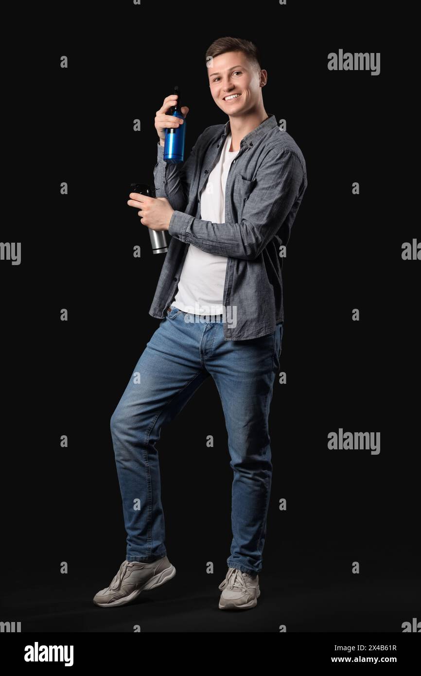 Portrait young adult man sprays hi-res stock photography and images - Alamy