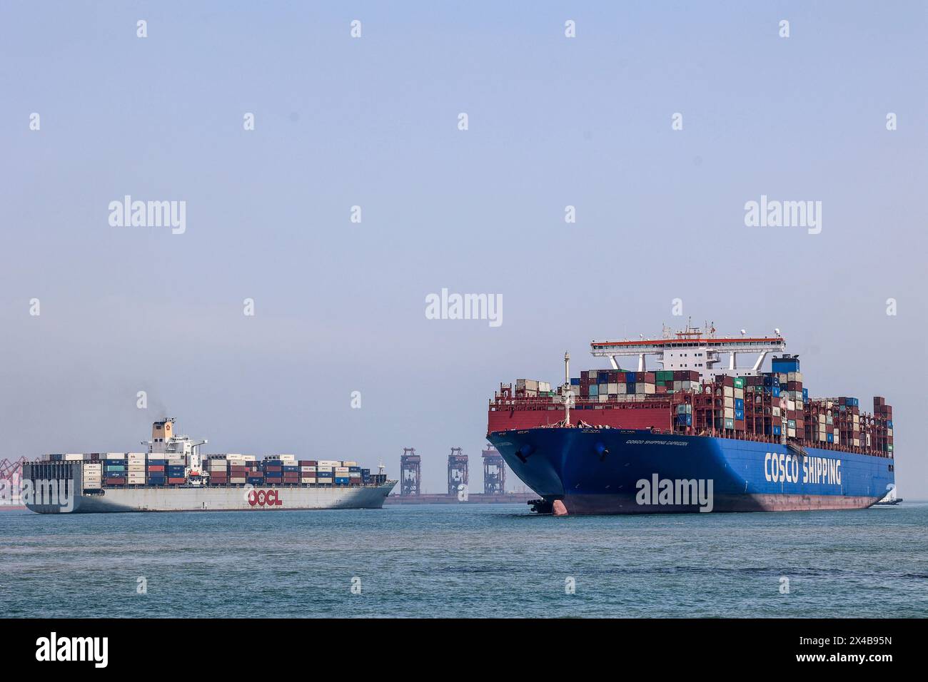 QINGDAO, CHINA - MAY 1, 2024 - The container loading and unloading ...
