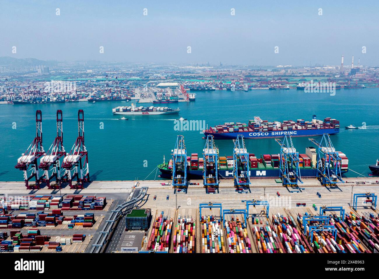 QINGDAO, CHINA - MAY 1, 2024 - The container loading and unloading ...