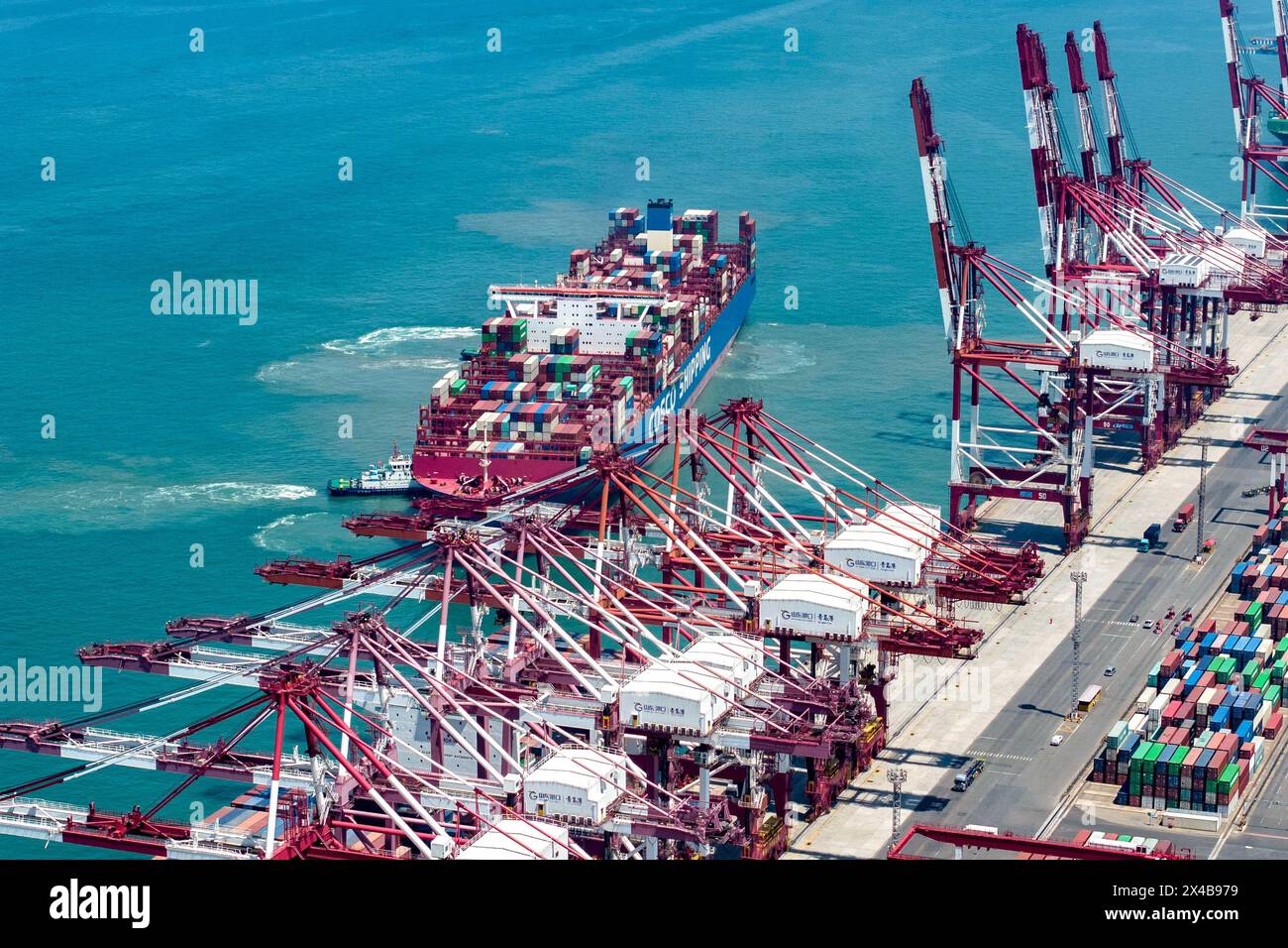 QINGDAO, CHINA - MAY 1, 2024 - The container loading and unloading ...