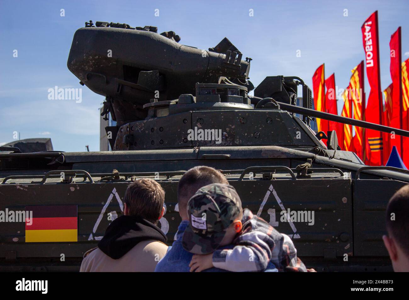Visitors of a newly opened exhibition of trophy military equipment ...