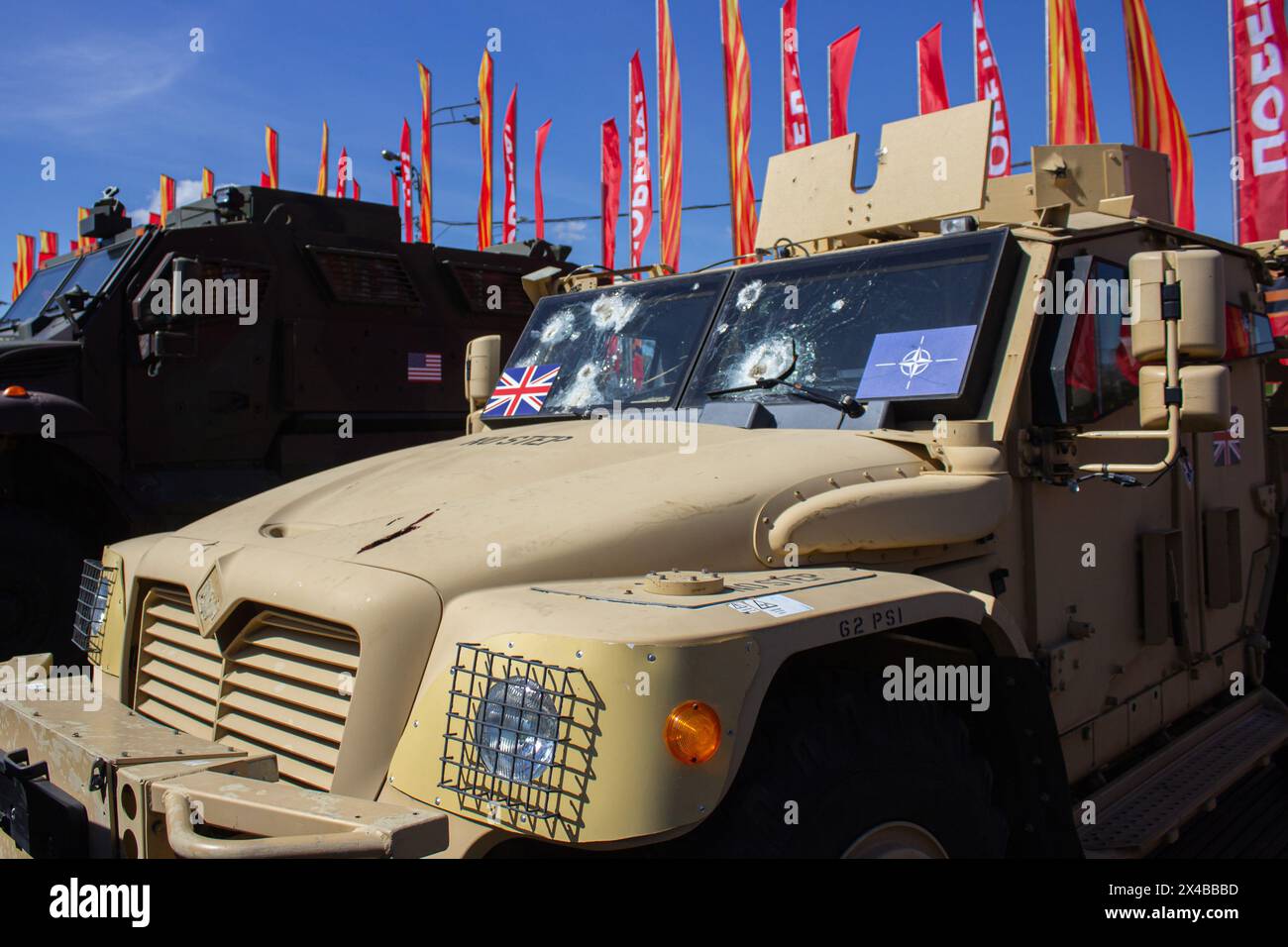 Bullet holes are seen on the windshield of a Husky TSV, a variant of ...