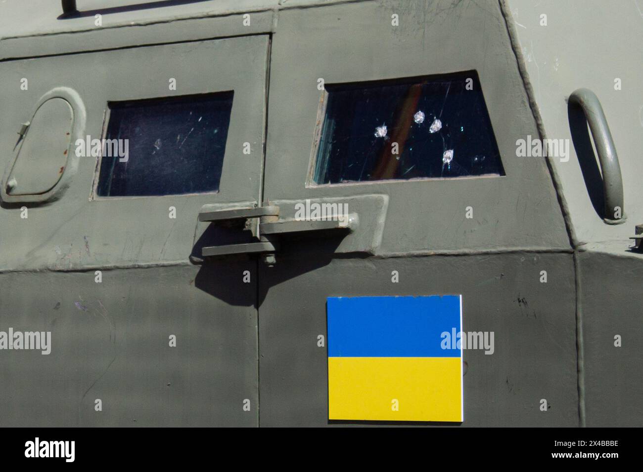 Bullet holes are seen on the windshield of an Ukraine-made armoured ...