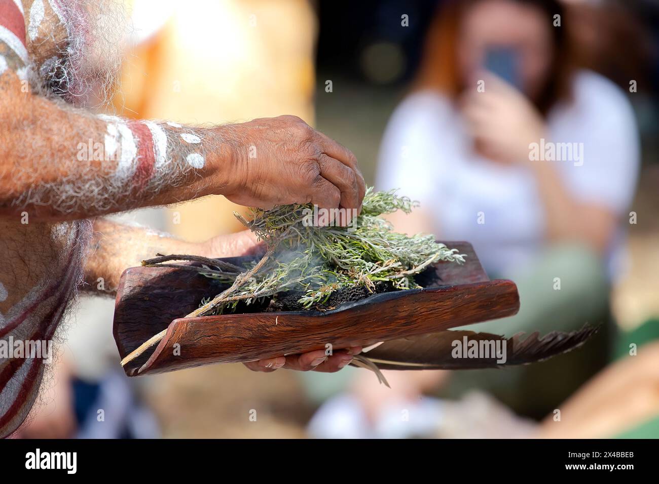 Ritual fire with green branch, smoke and fire, the smoke ritual rite at ...