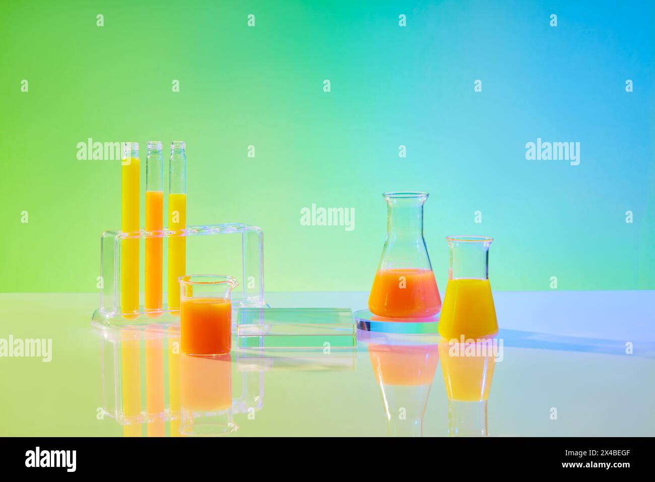 Science and medical background with lab glassware filled yellow liquid ...