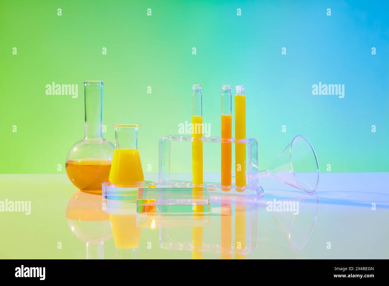 Front view of laboratory equipments decorated on green gradient ...