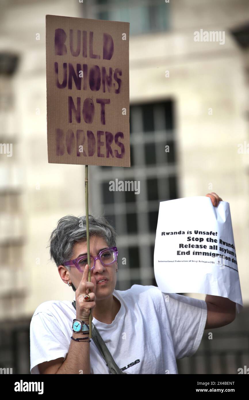 London, UK. 01st May, 2024. A protester holds a sign saying ‘Build ...
