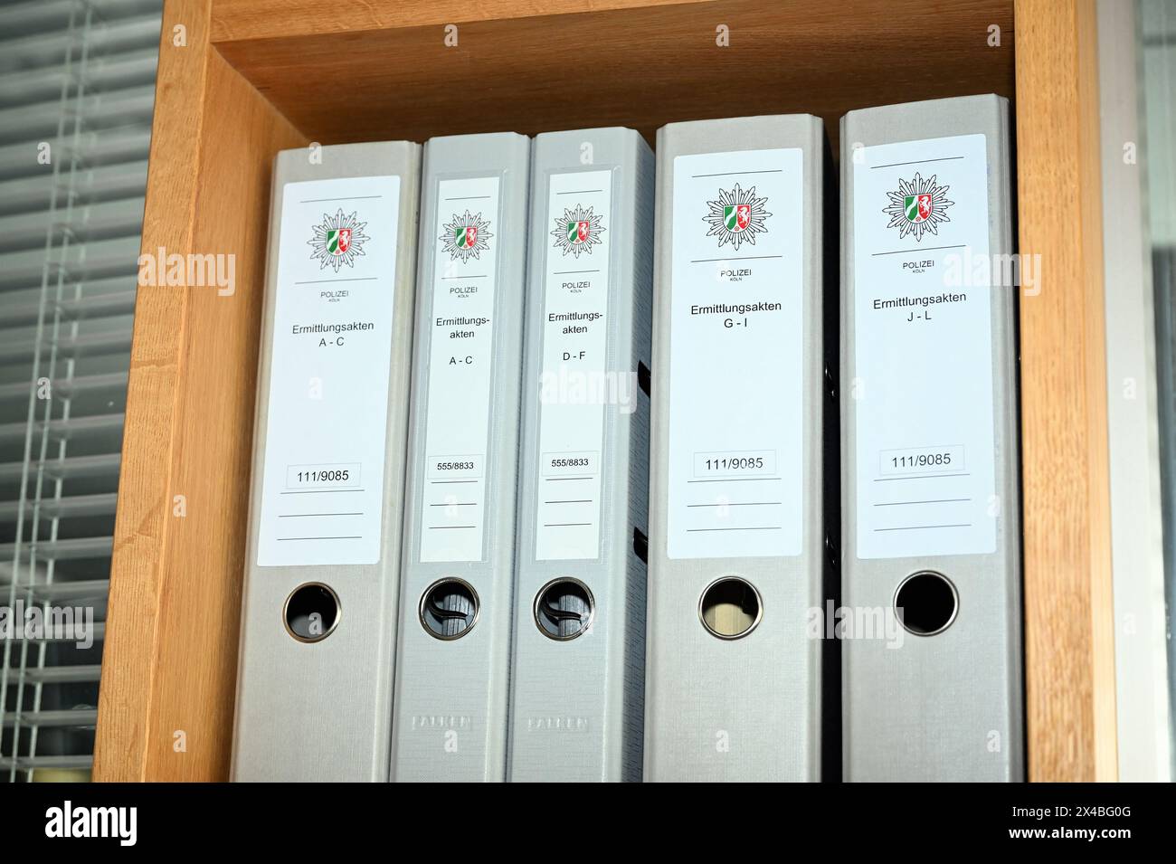 Cologne, Germany. 26th Apr, 2024. Folder with police files on the shelf ...