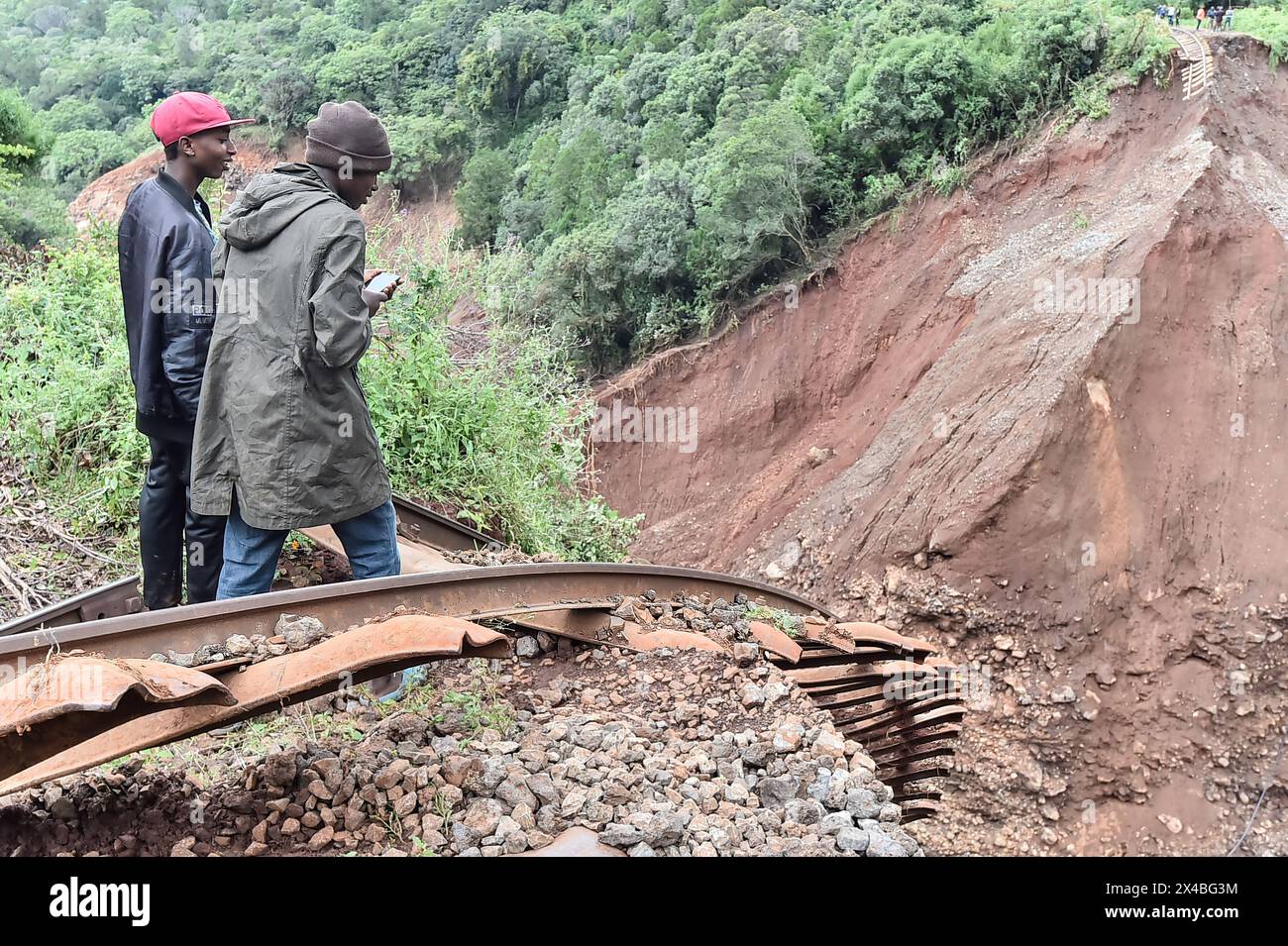 Kiambu, Kenya. 01st May, 2024. People look at the destroyed railway ...