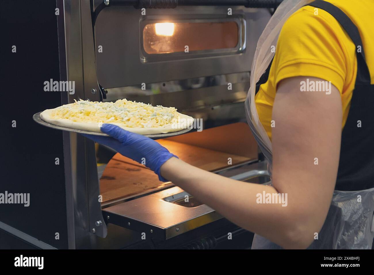 Process of making pizza in the bakery. Food Stock Photo - Alamy