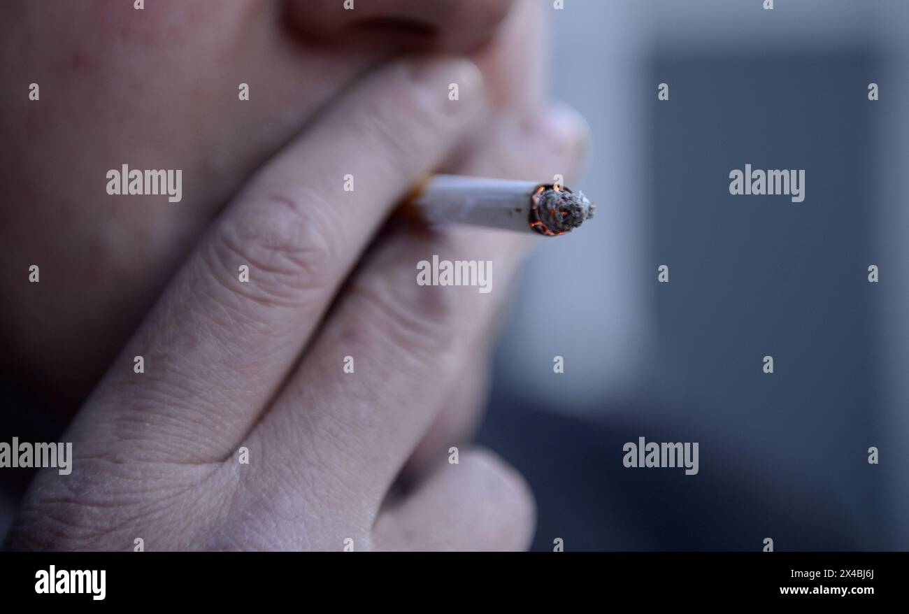 PICTURE POSED BY A MODEL: File photo dated 12/03/13 of a man smoking a ...