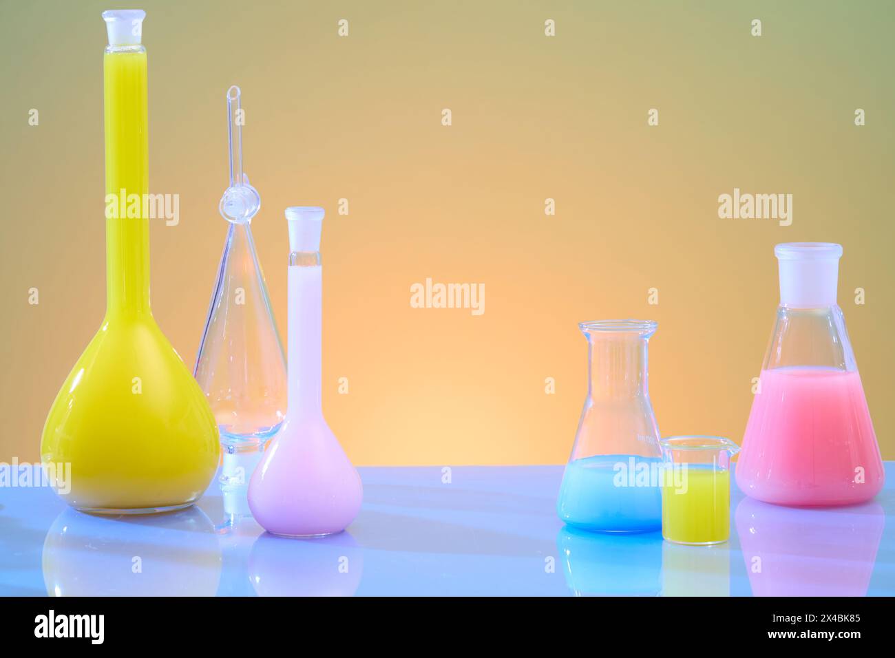 Science and medical background with laboratory glass containing ...