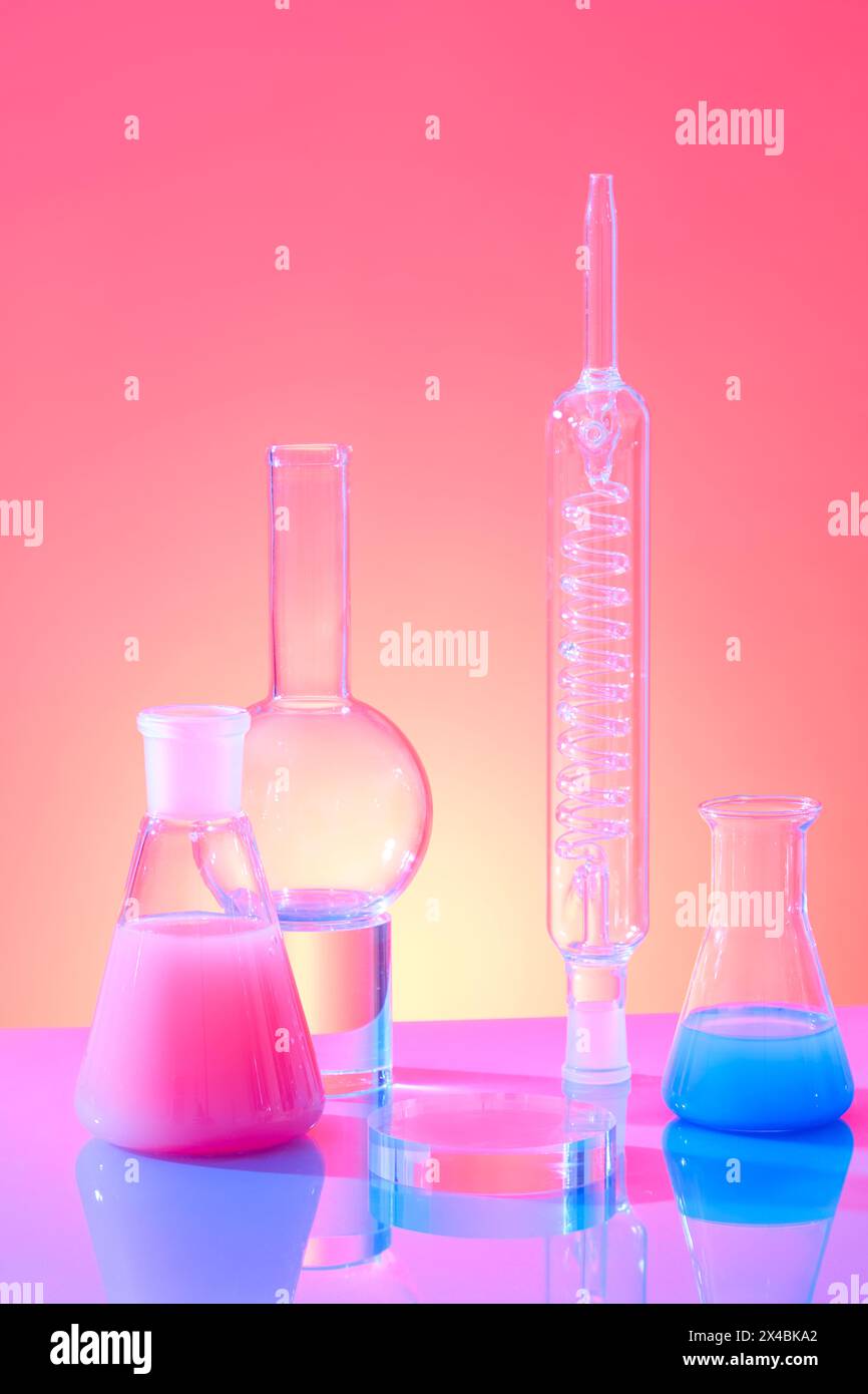 Erlenmeyer flasks containing color liquid decorated with boiling flask ...