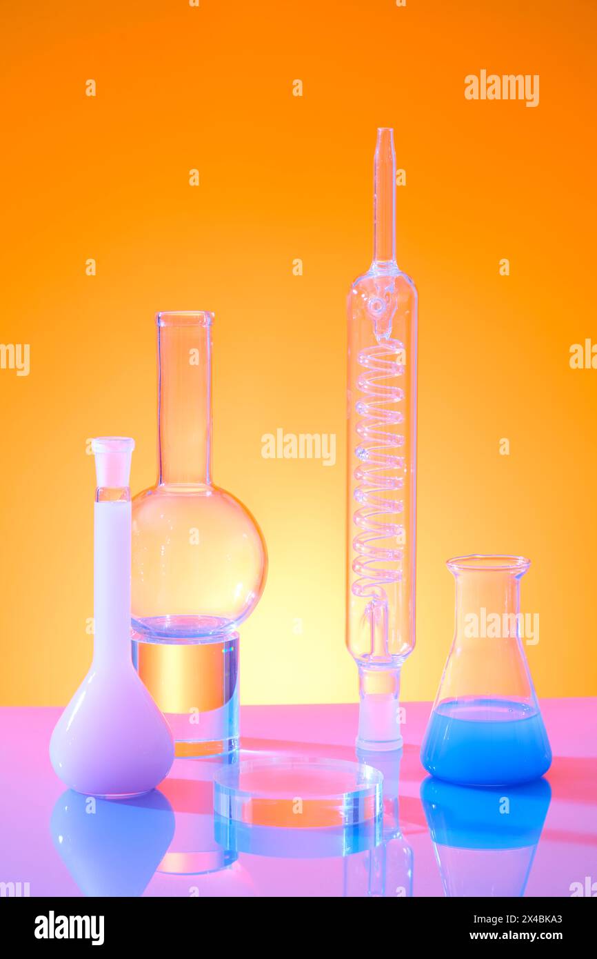 A glass round podium for product display decorated with lab equipments ...