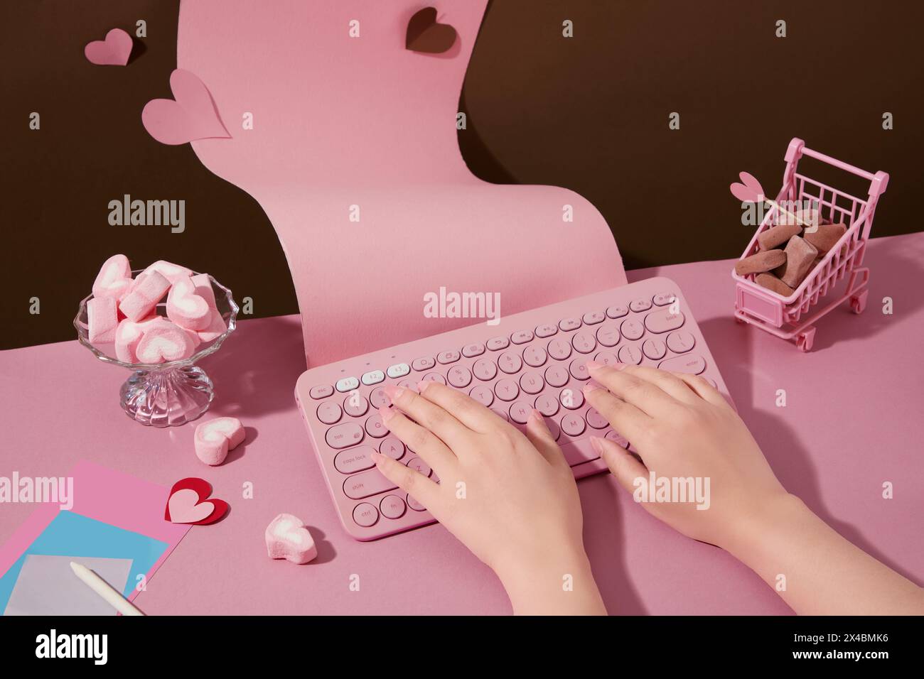On pink and brown background, cute decorations displayed - sweet candy ...