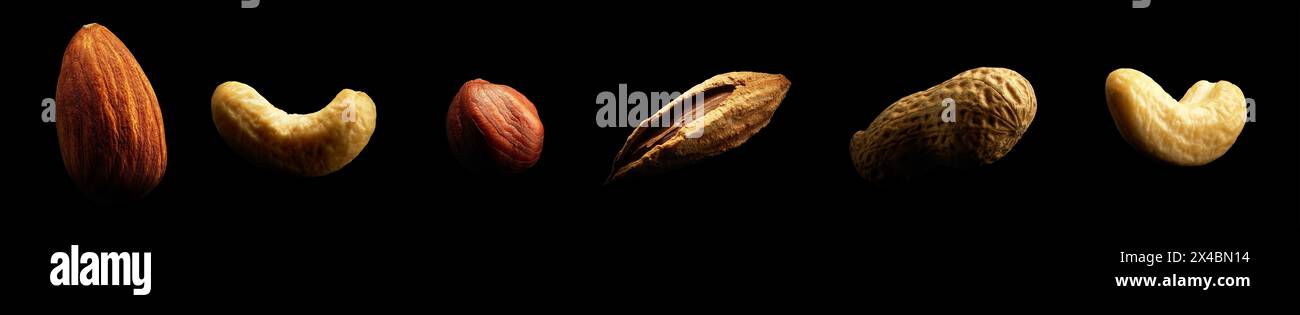 Group of nuts isolated on black background. Close-up or macro. Health ...