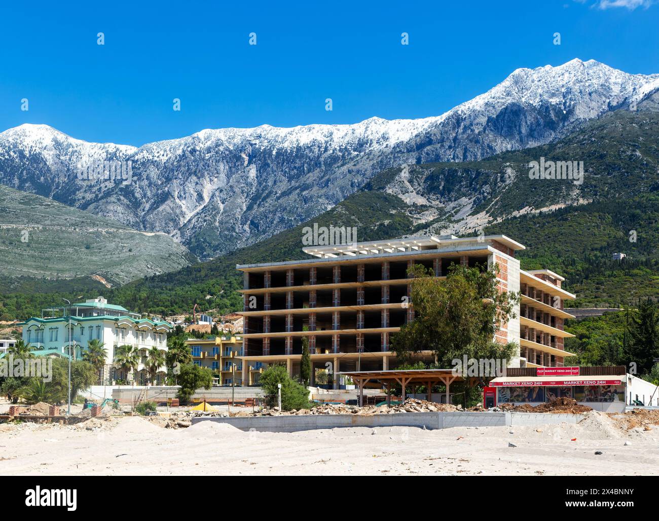 Tourist development construction building work view from Drymades beach ...