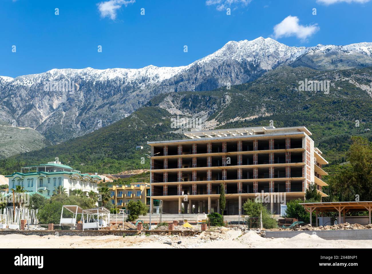 Tourist development construction building work view from Drymades beach ...