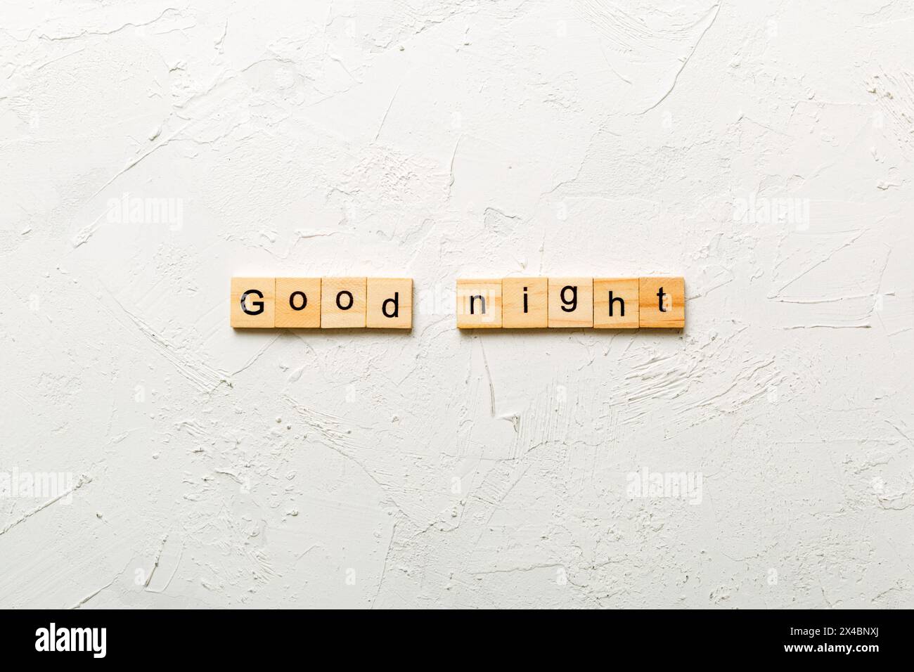 good night word written on wood block. good night text on table ...