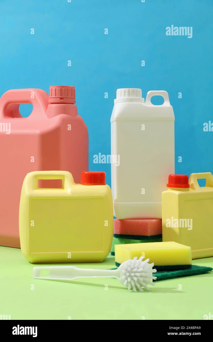 Front of plastic canisters with different sizes and colors decorated on ...