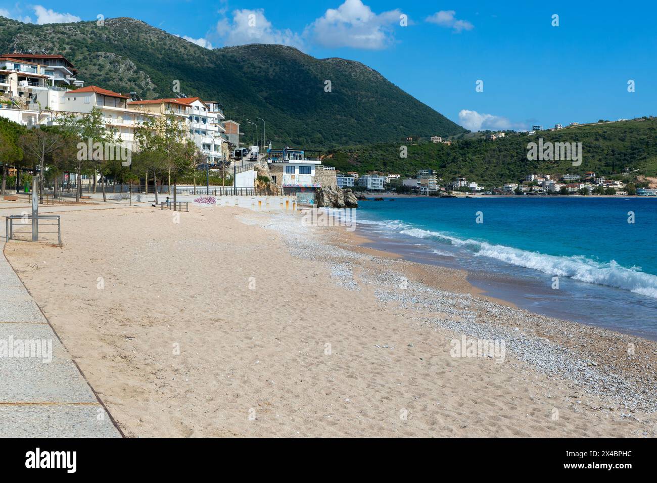 Turquoise blue sea at town beach of Himare, Albanian Riviera, Albania ...