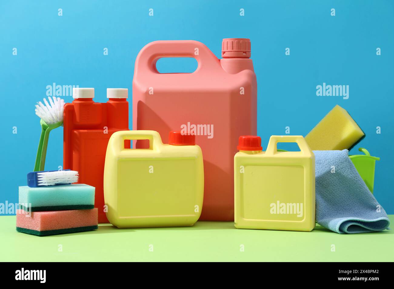 On a blue background, colorful empty canisters decorated with cleaning ...