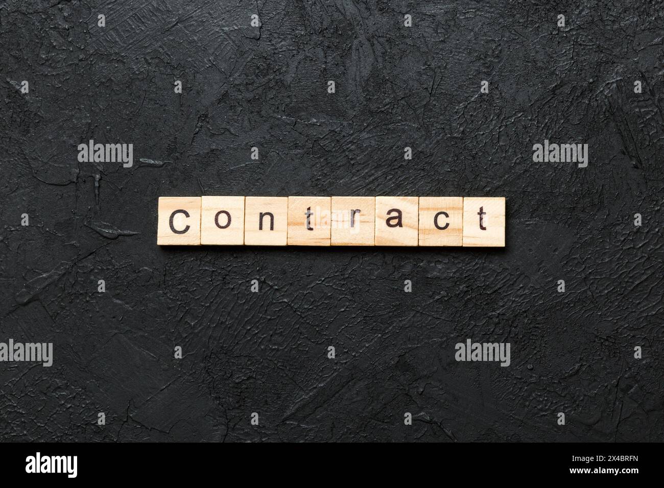 contract word written on wood block. contract text on table, concept ...