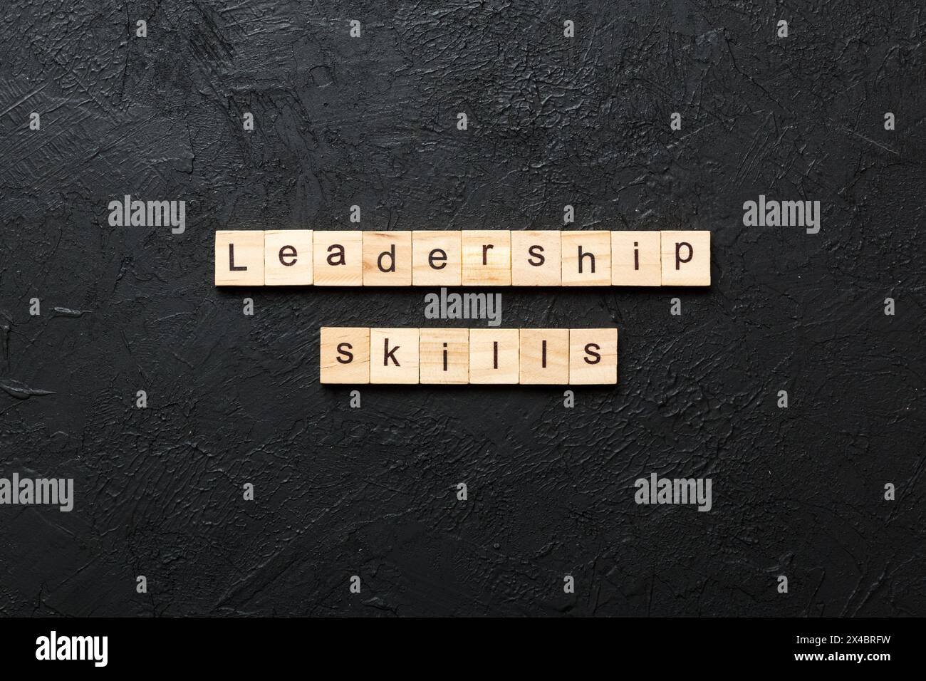 Leadership skills word written on wood block. Leadership skills text on ...