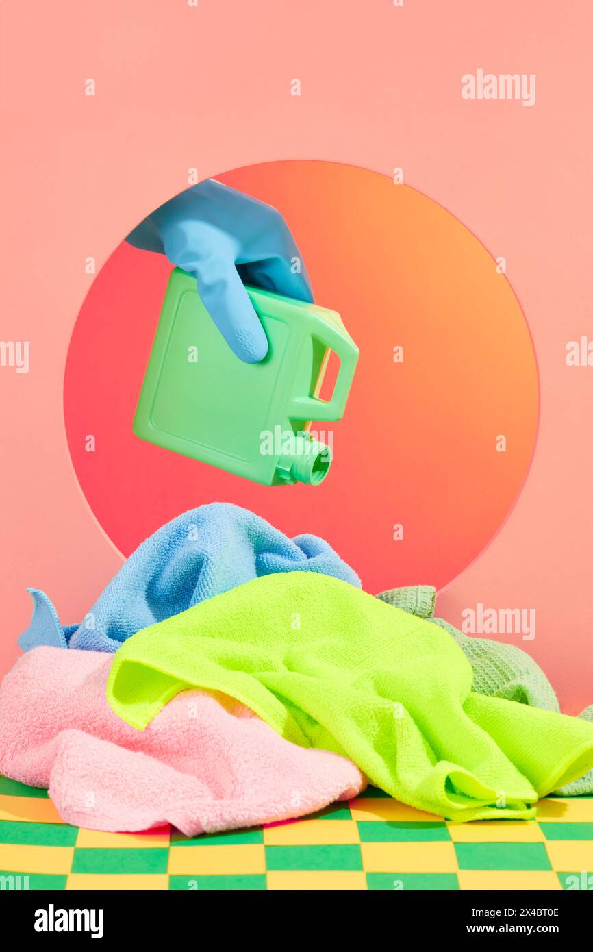 On the color background, a hand holding a plastic container and slowly ...