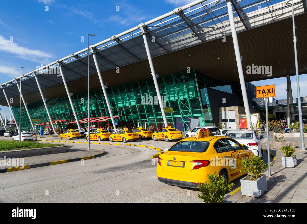 Taxis outside terminal building Tirana International Airport Nënë ...
