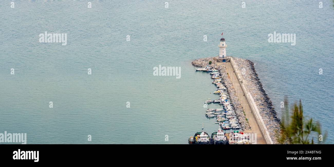 Lighthouse in Alanya marina, one of the touristic districts of Antalya ...