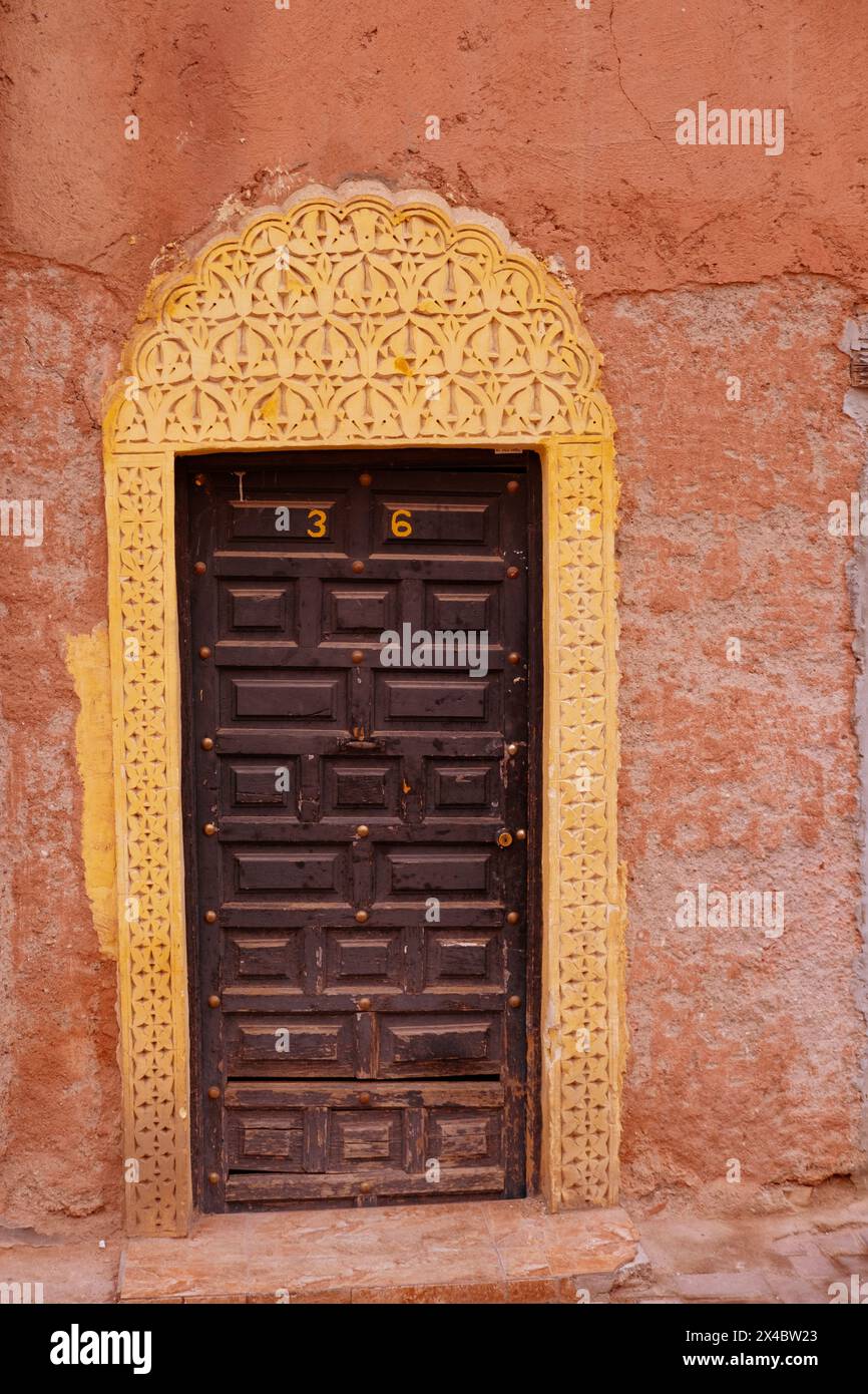 old fortress wall with gate, Authentic details traditional Moroccan ...