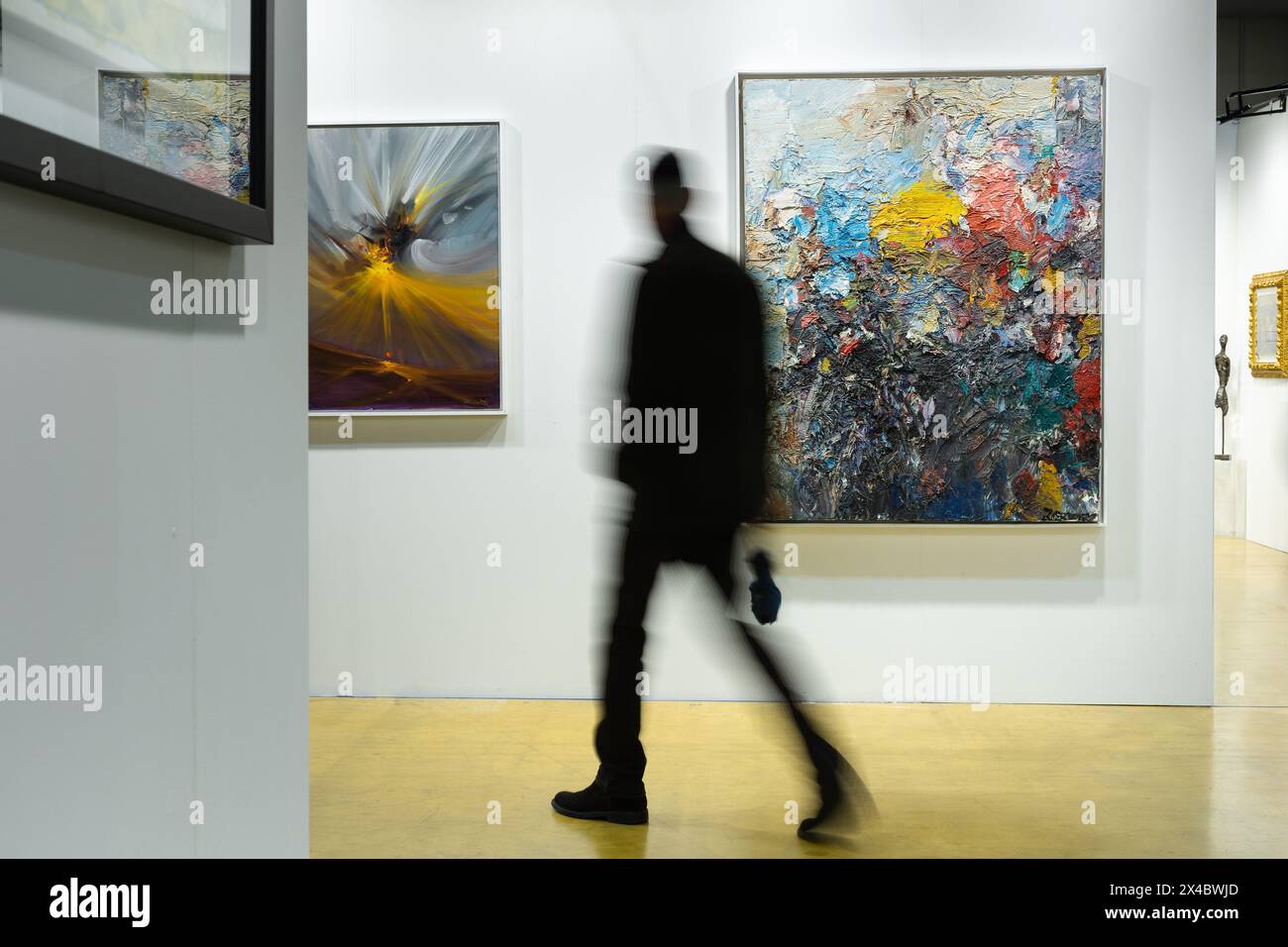 People Walking and Admiring Paintings in a Modern Art Gallery Stock ...