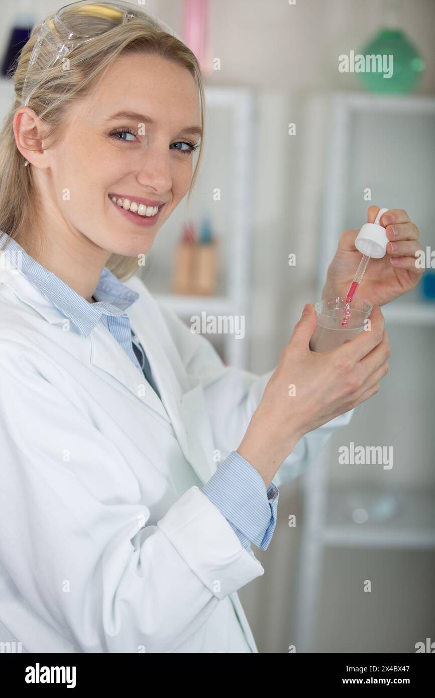 young attractive female scientist in chemical laboratory Stock Photo ...