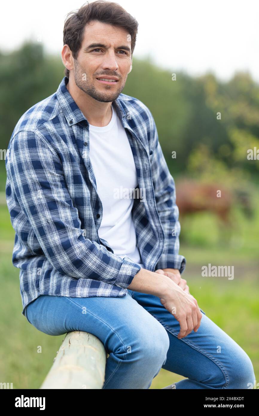 middle aged farmer and his farm Stock Photo - Alamy