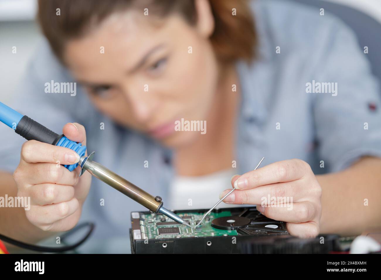 Magnifying glass soldering printed hi-res stock photography and images ...