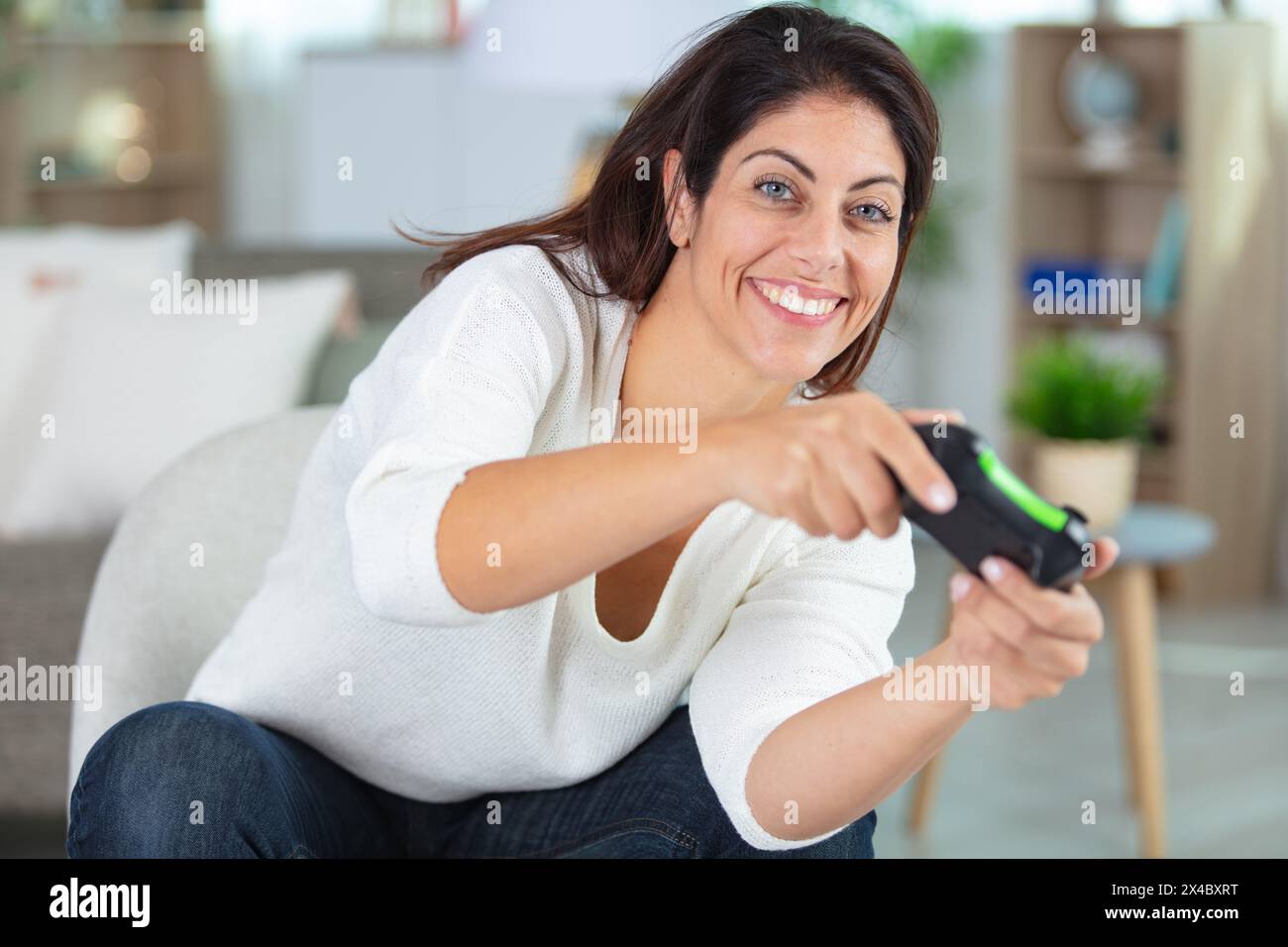 Attractive gamer girl playing video hi-res stock photography and images ...