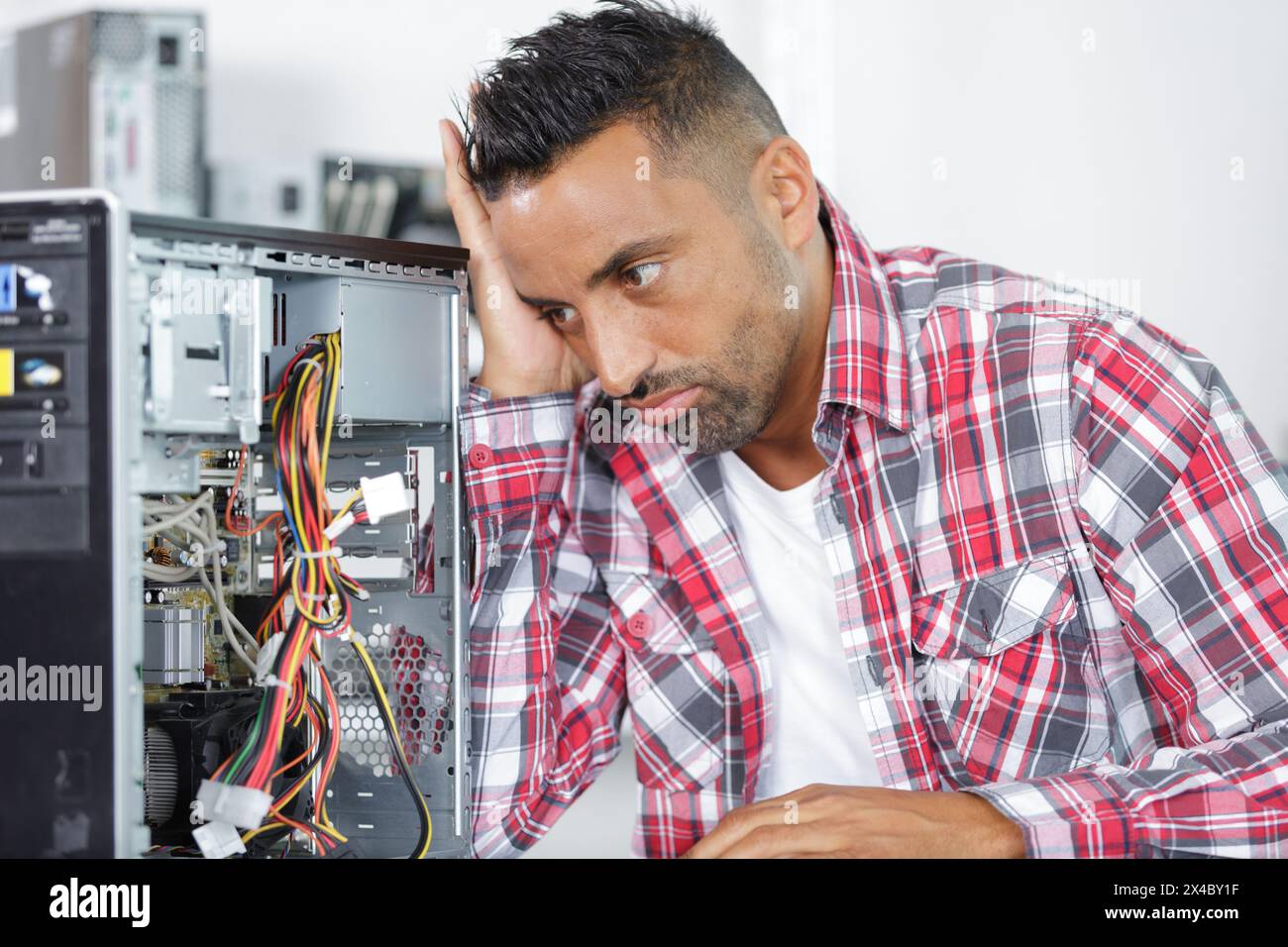 Computer man frustrated repair hi-res stock photography and images - Alamy