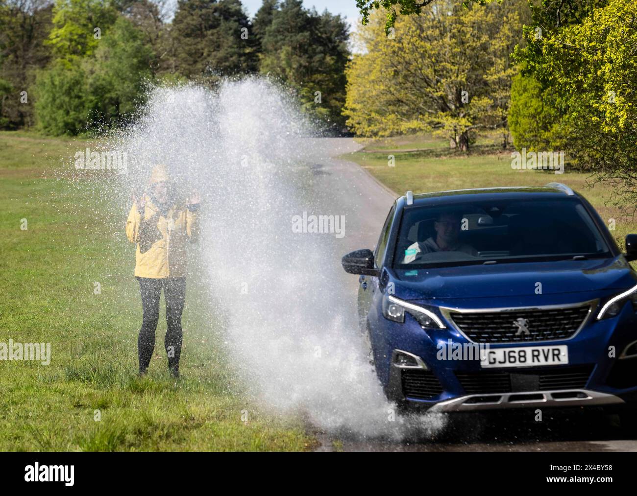 EDITORIAL USE ONLY Inspectors measure the size of splashes made by a ...