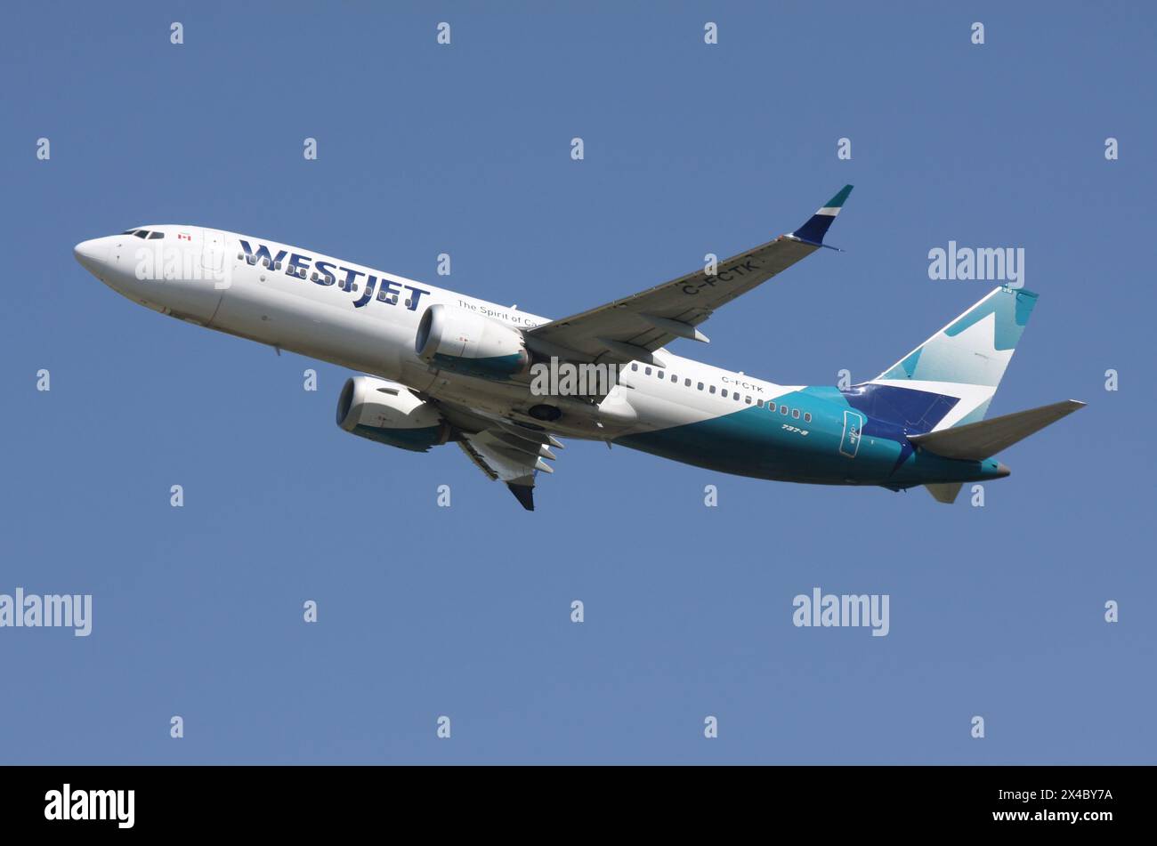 A Boeing 737-8 MAX of Westjet departs London Gatwick Airport Stock ...
