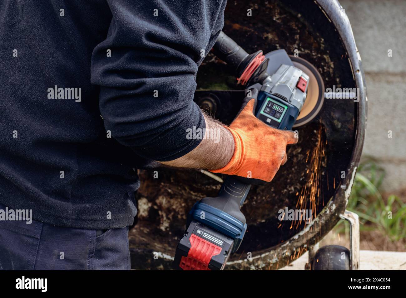 Man using portable grinder hi-res stock photography and images - Alamy