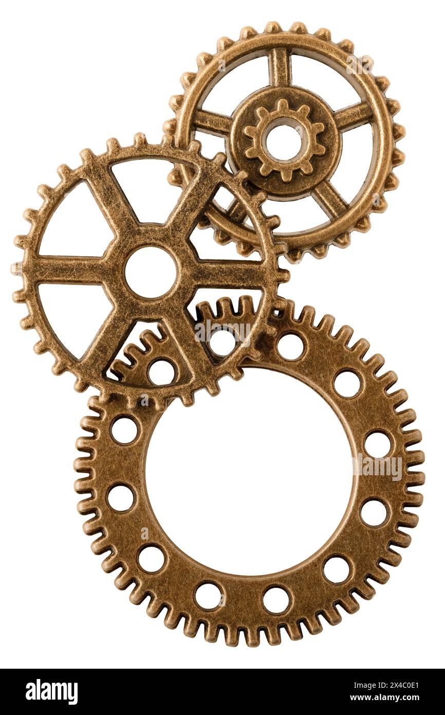 Group of aged bronze cogwheels, arranged as part of antique mechanism ...