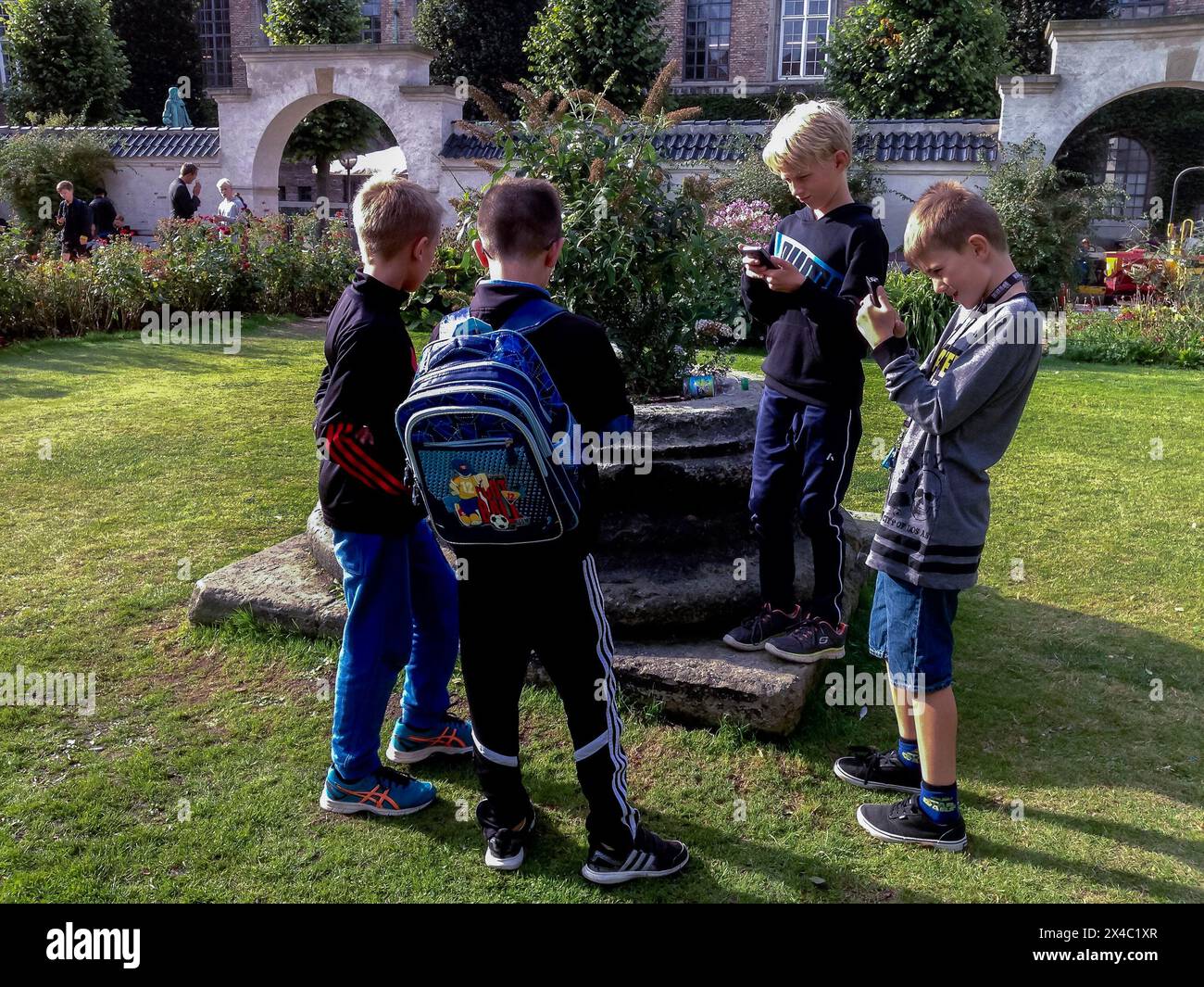 Copenhagen, Denmark, Group Children, Teens, Boys, Using Smart Phones ...